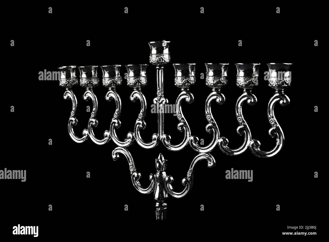 Silver Hanukkah Menorah on a black background Stock Photo - Alamy