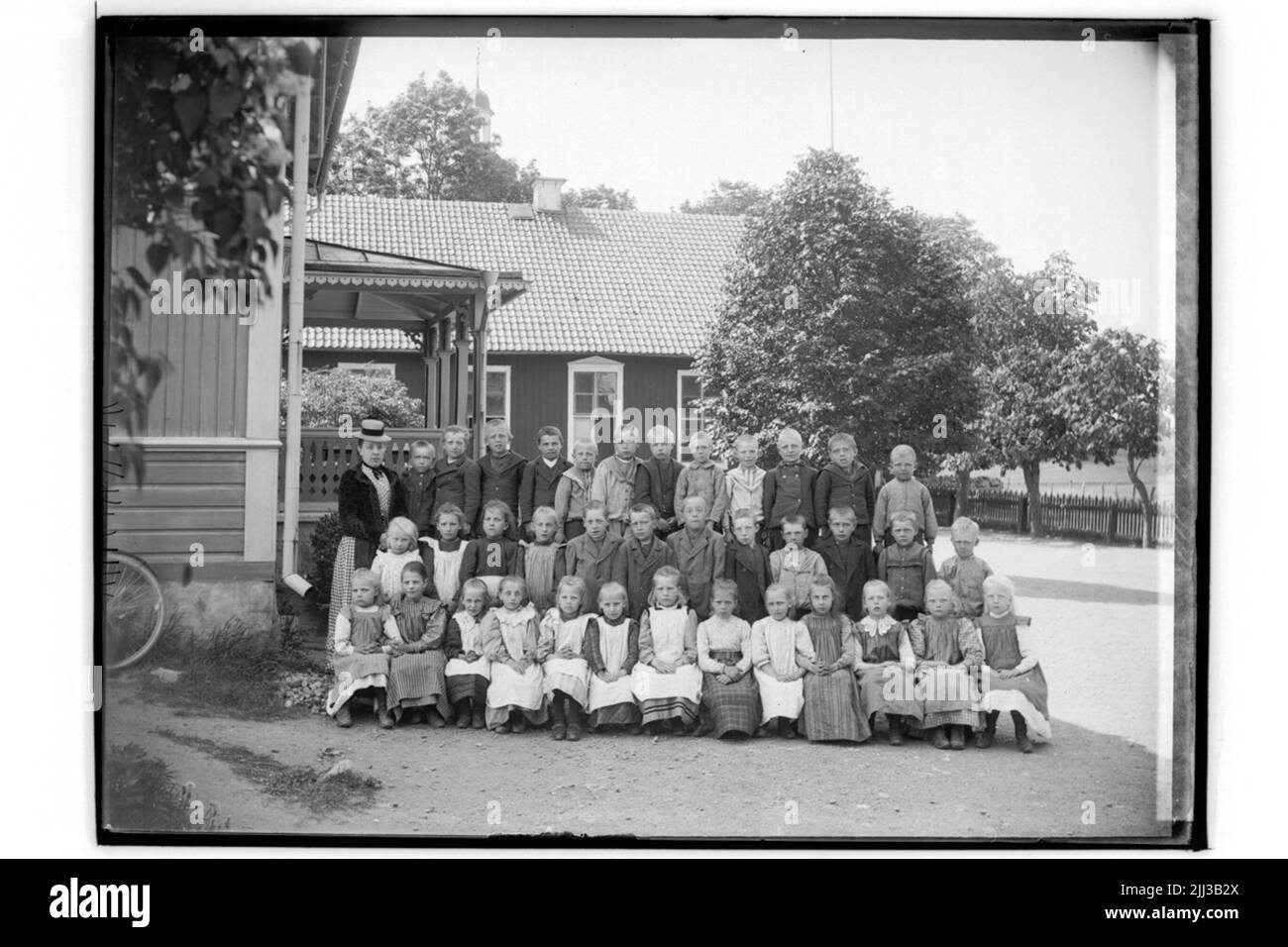 Large intermediate school, school building, 37 school children and a ...