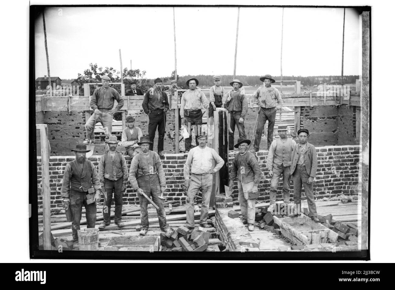 16 construction workers. Dealer Öholm Stock Photo - Alamy