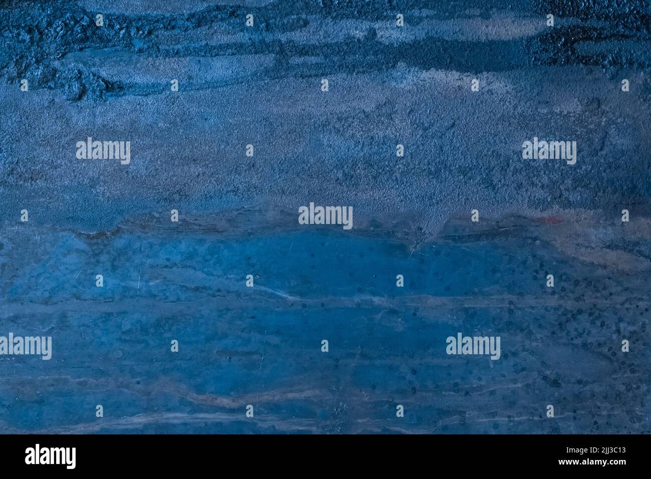 Blue metal surface with dark traces of fuel oil old steel texture ...