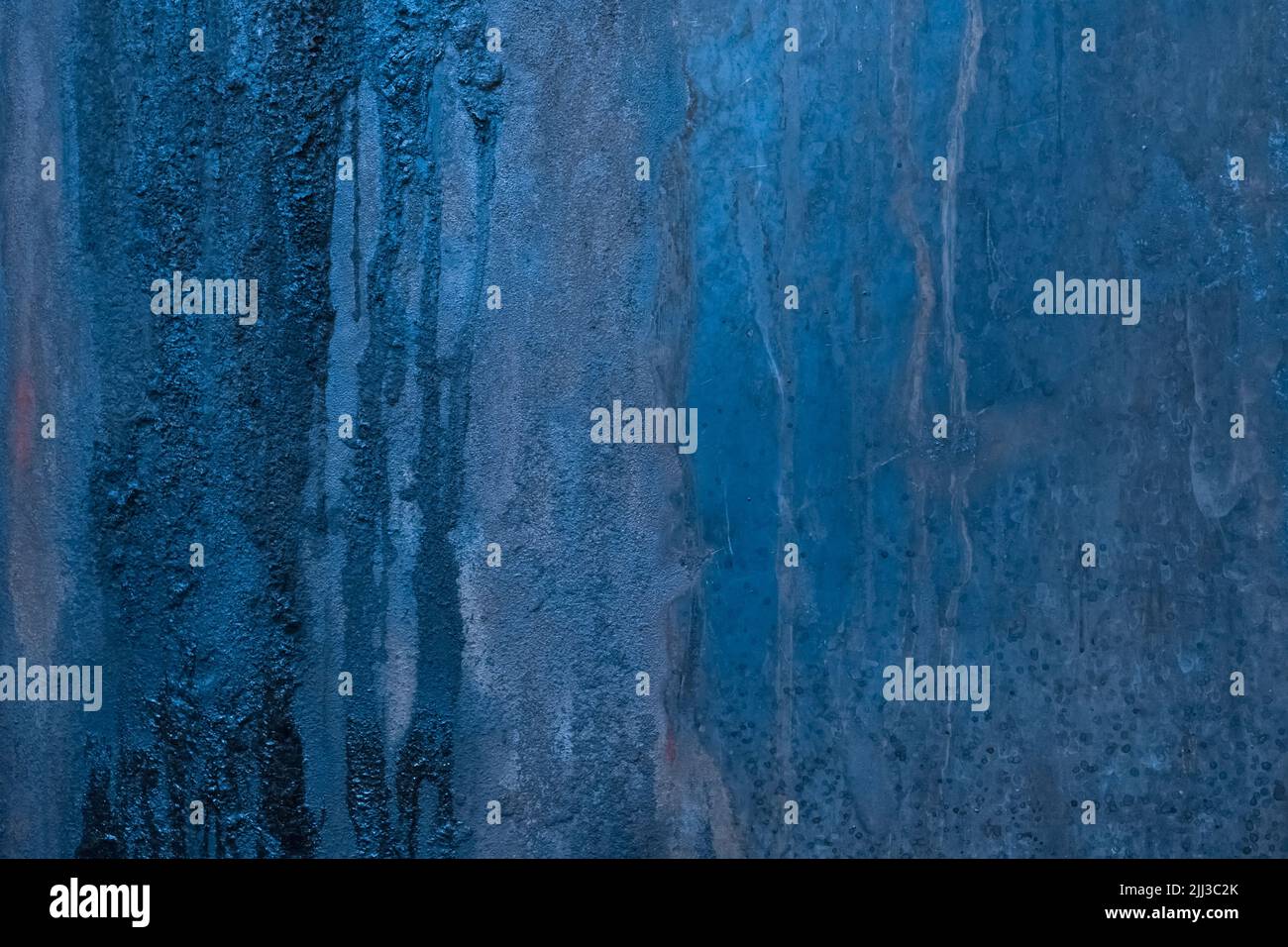 Blue metal surface with dark traces of fuel oil old steel texture ...