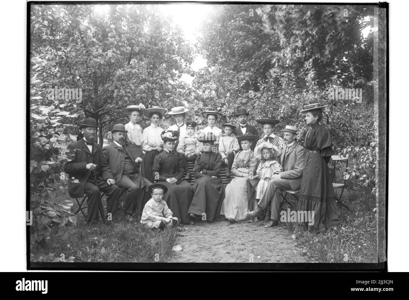 Family Group.Gross dealer Johan Persson Stock Photo - Alamy