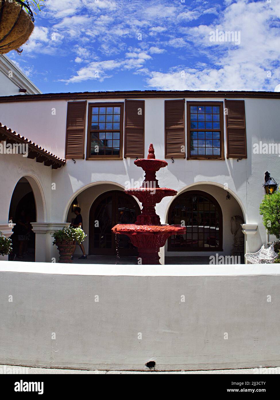 red fountain in a building Stock Photo - Alamy