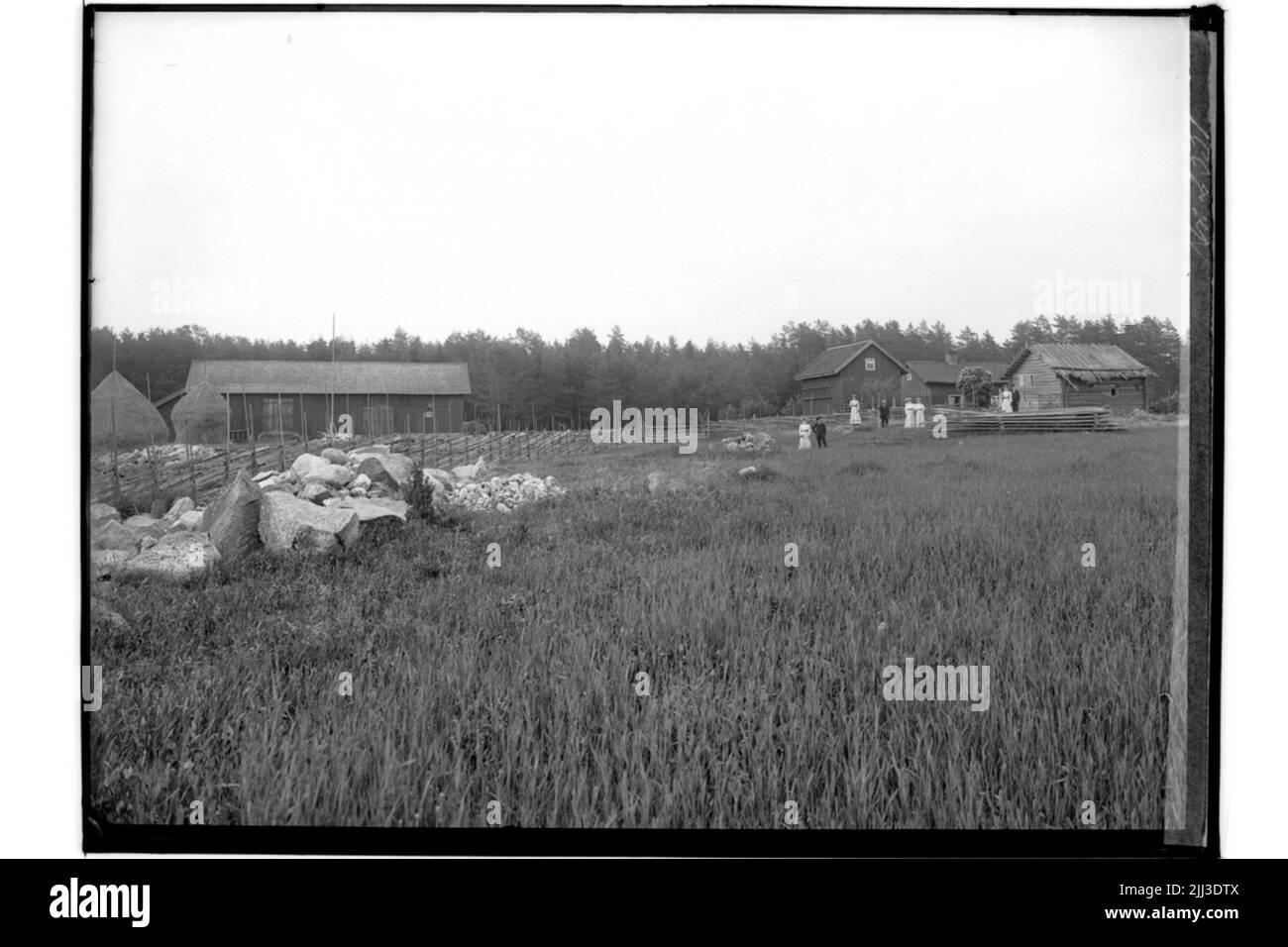 Single cottage and economy buildings, 8 people.a.p. Nilsson Stock Photo ...