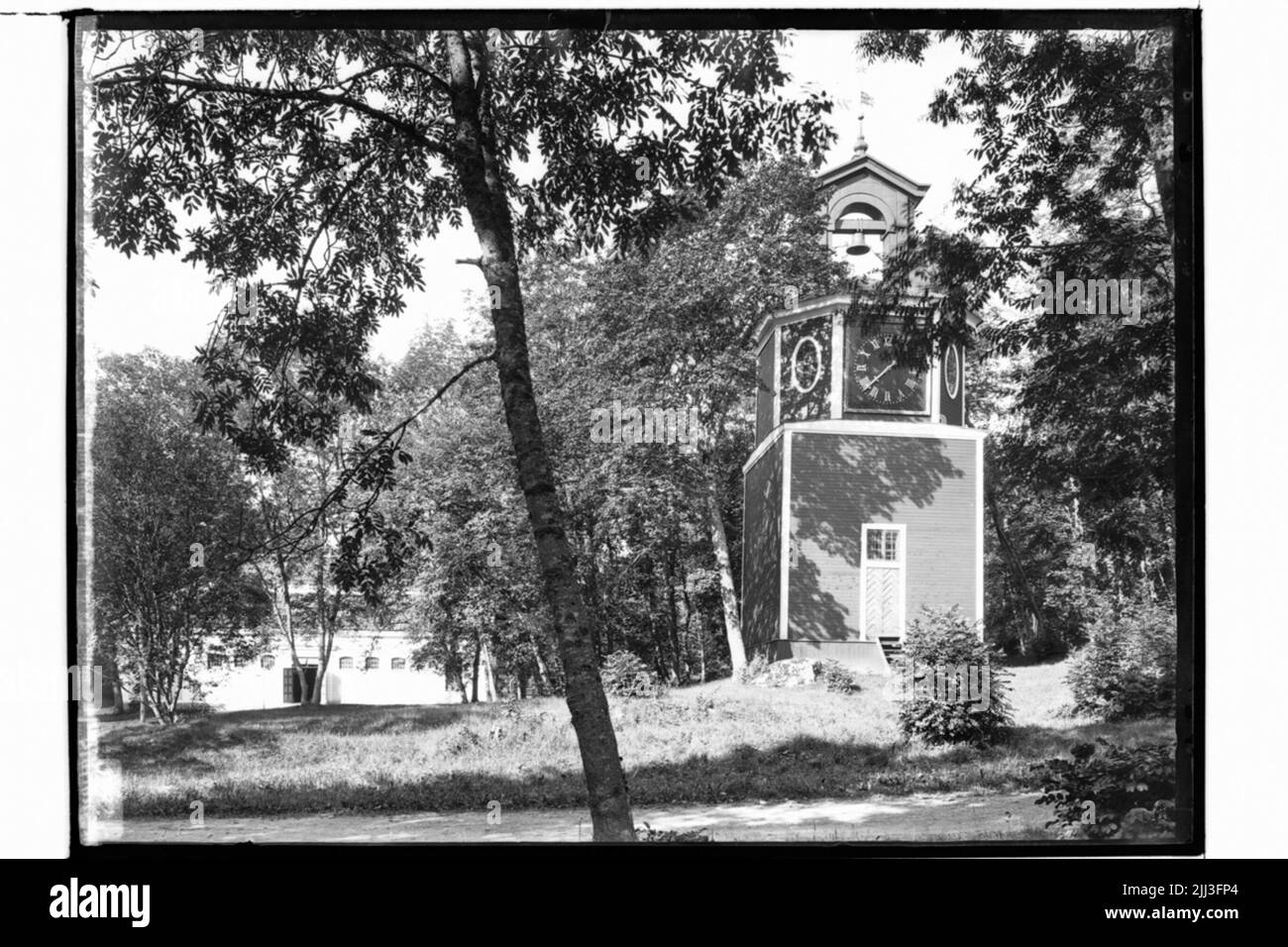 Steninge Castle, the belfry with clockwork. Building in the background ...