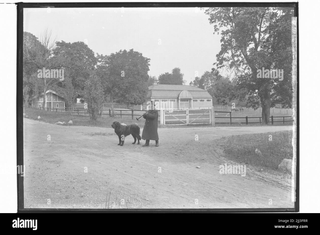 Man and dog statue Black and White Stock Photos & Images - Alamy
