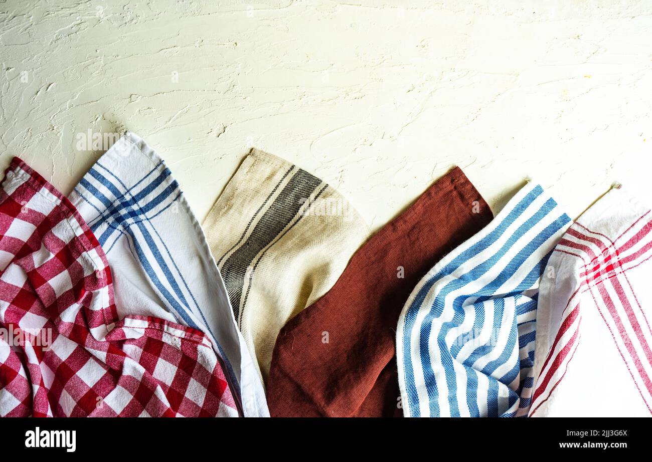 Kitchen textile towel on concrete table background with copy space ...