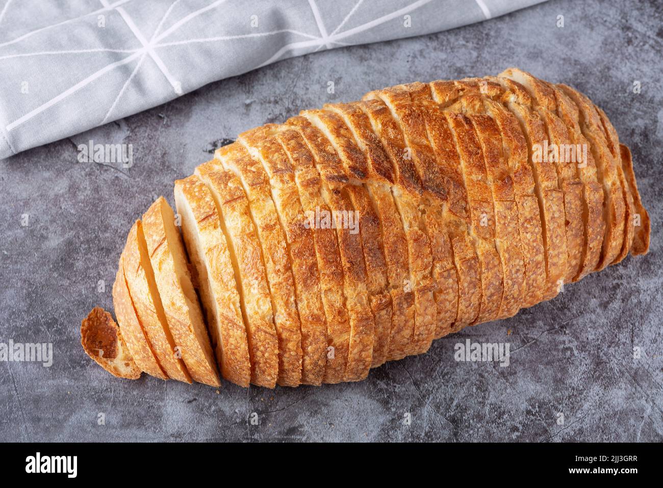 Fresh white loaf of bread on gray cement background. Top view Stock ...