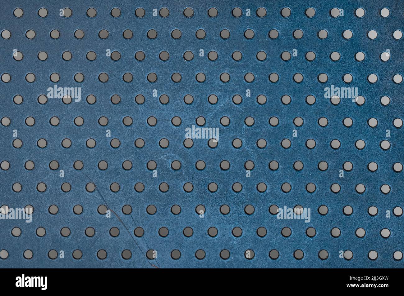 Perforated metal blue hole hi-res stock photography and images - Alamy