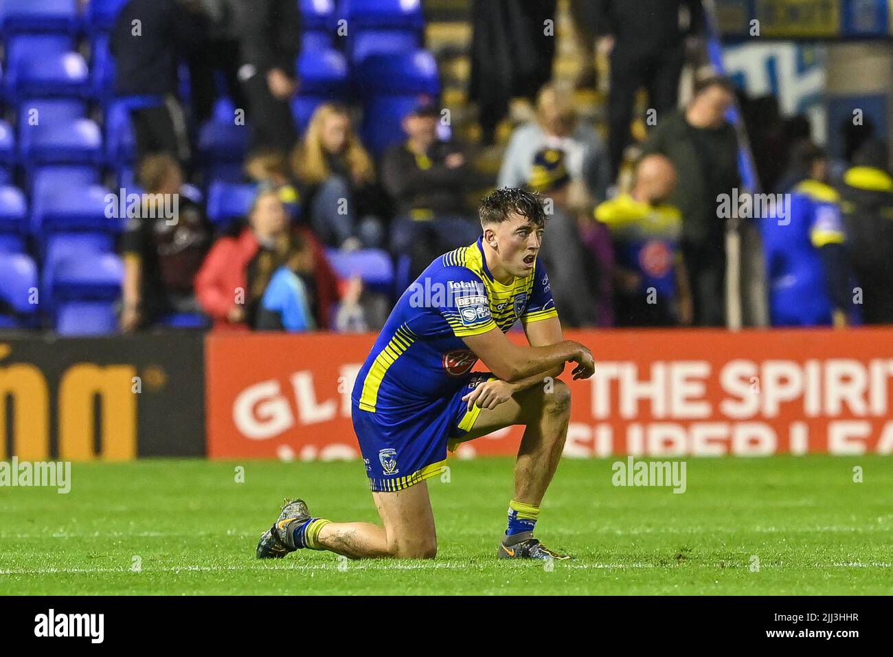 Matty Ashton #5 of Warrington Wolves is dejected at the end of the game ...