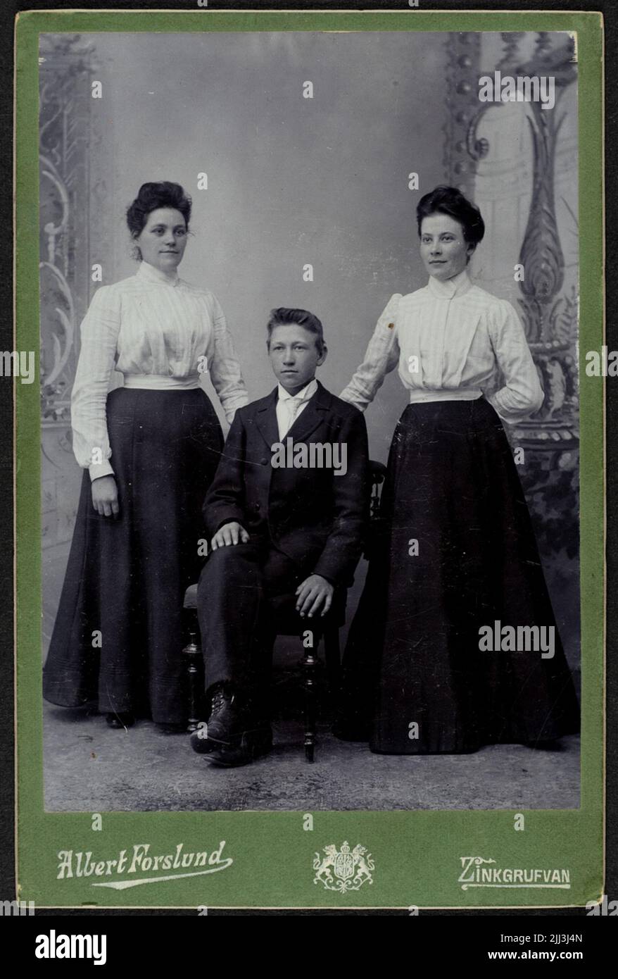 Two women and one man Stock Photo - Alamy
