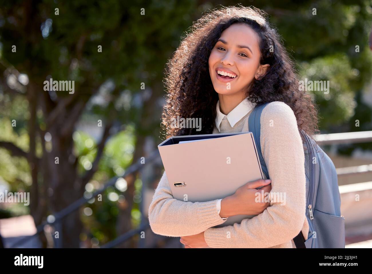 Destined for bigger things. Portrait of an attractive young female ...