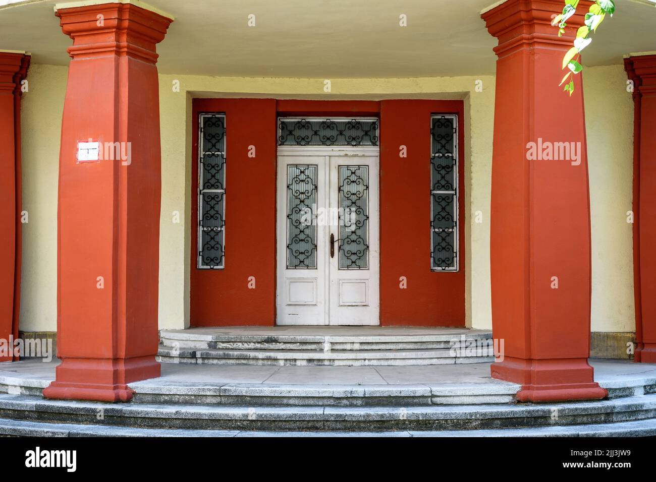 Front of the old building (facade), historic wooden door (gate ...