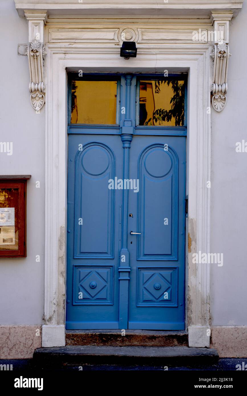 Front of the old building (facade), historic wooden door (gate ...
