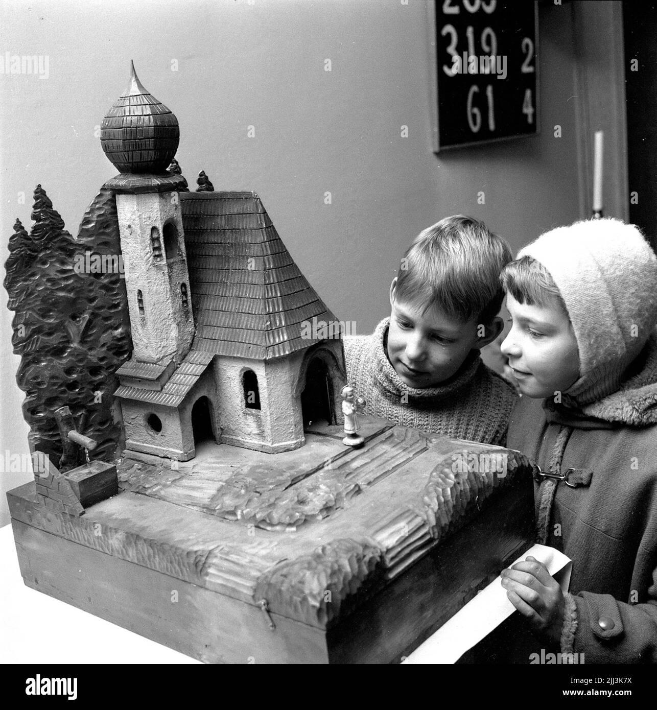 Playing church gives money to roast temples.december 1956 Stock Photo ...