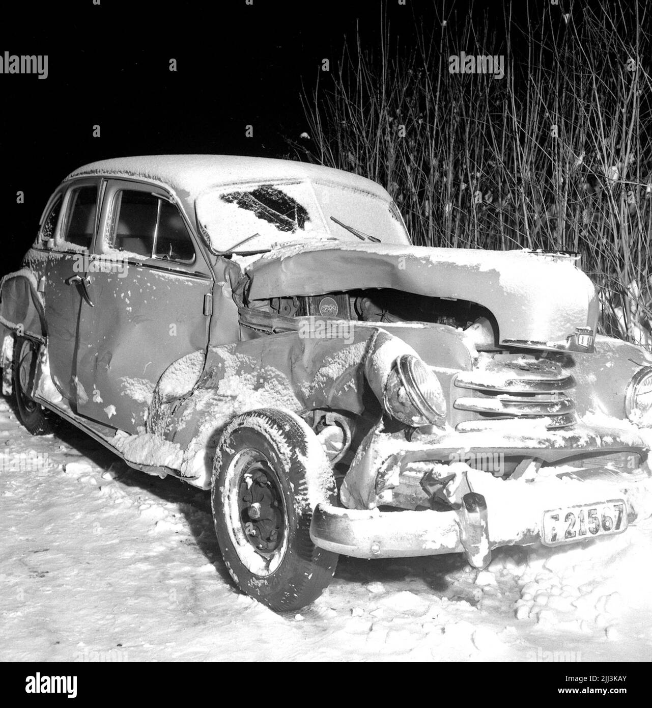Creation between car and rail bus in ground. December 27, 1958 Stock ...