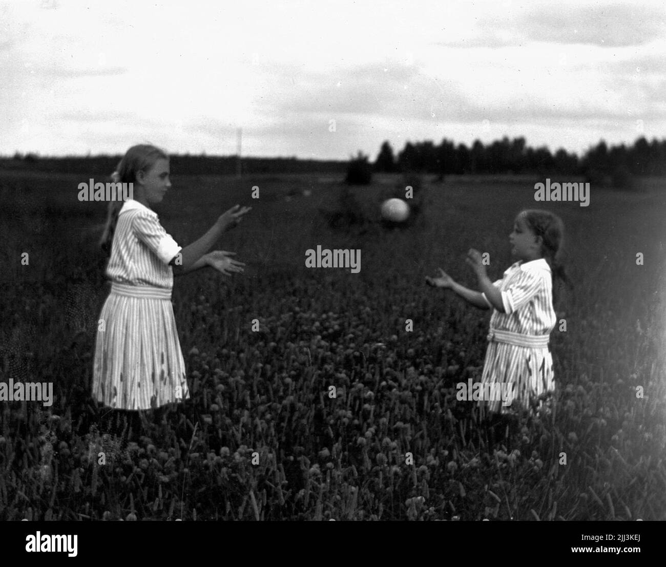 Playing girls Black and White Stock Photos & Images - Alamy