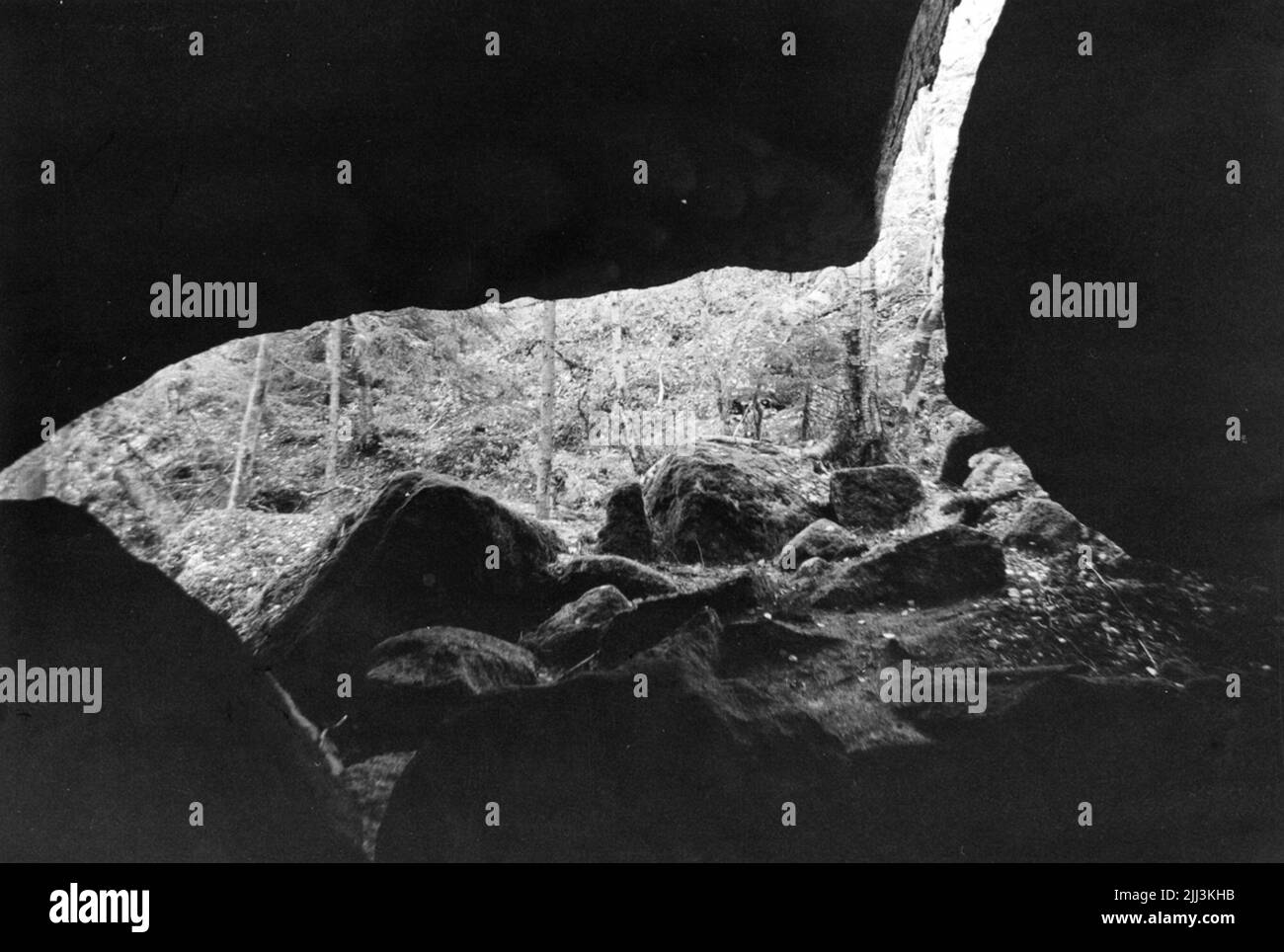 Cave, stone source. View through the small vault Stock Photo - Alamy