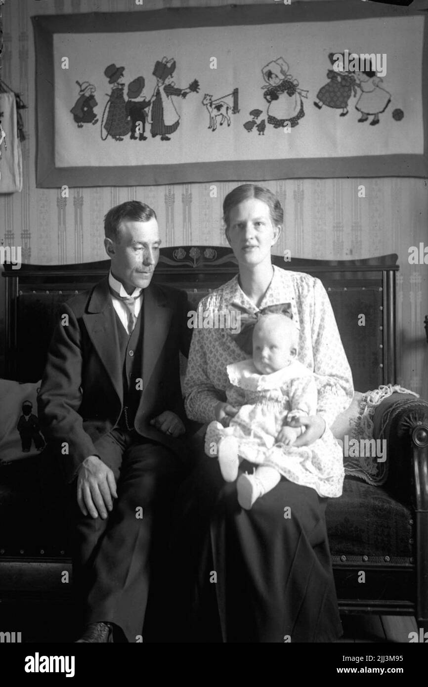 Room interior, family group Three people. According to the first ...