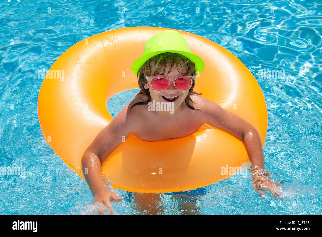 Kids on float hi-res stock photography and images - Alamy