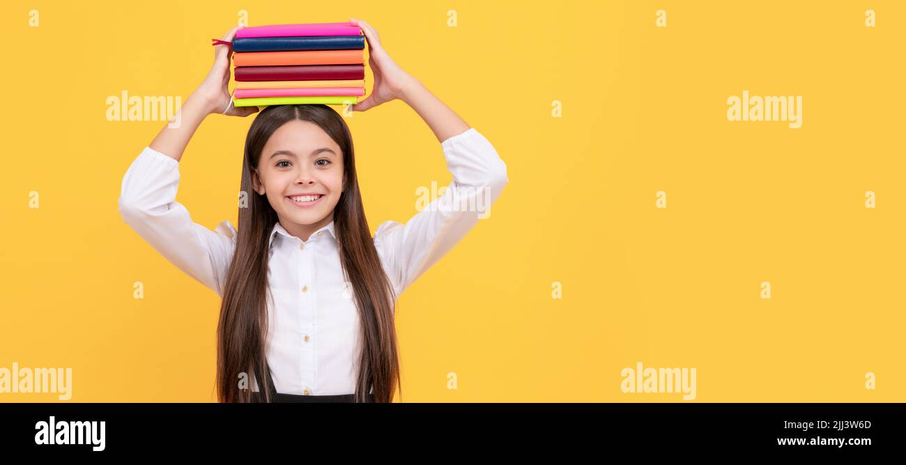 happy teen girl in school uniform hold book stack, knowledge. Portrait ...