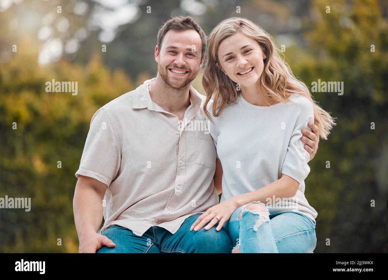 Young happy loving caucasian couple hugging and enjoying a day together ...