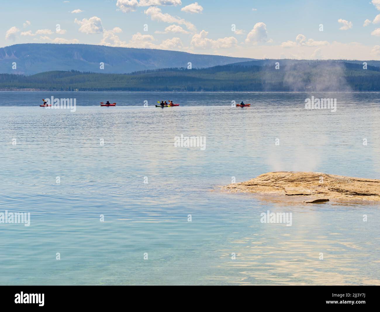 People playing Kayak in Yellowstone Lake of Yellowstone National Park ...