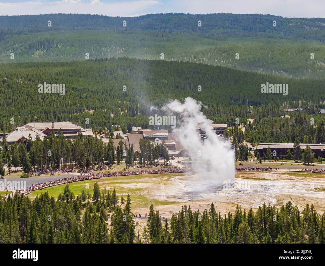 Aerial view of the Old Faithful geyser hot water eruptions at Wyoming ...