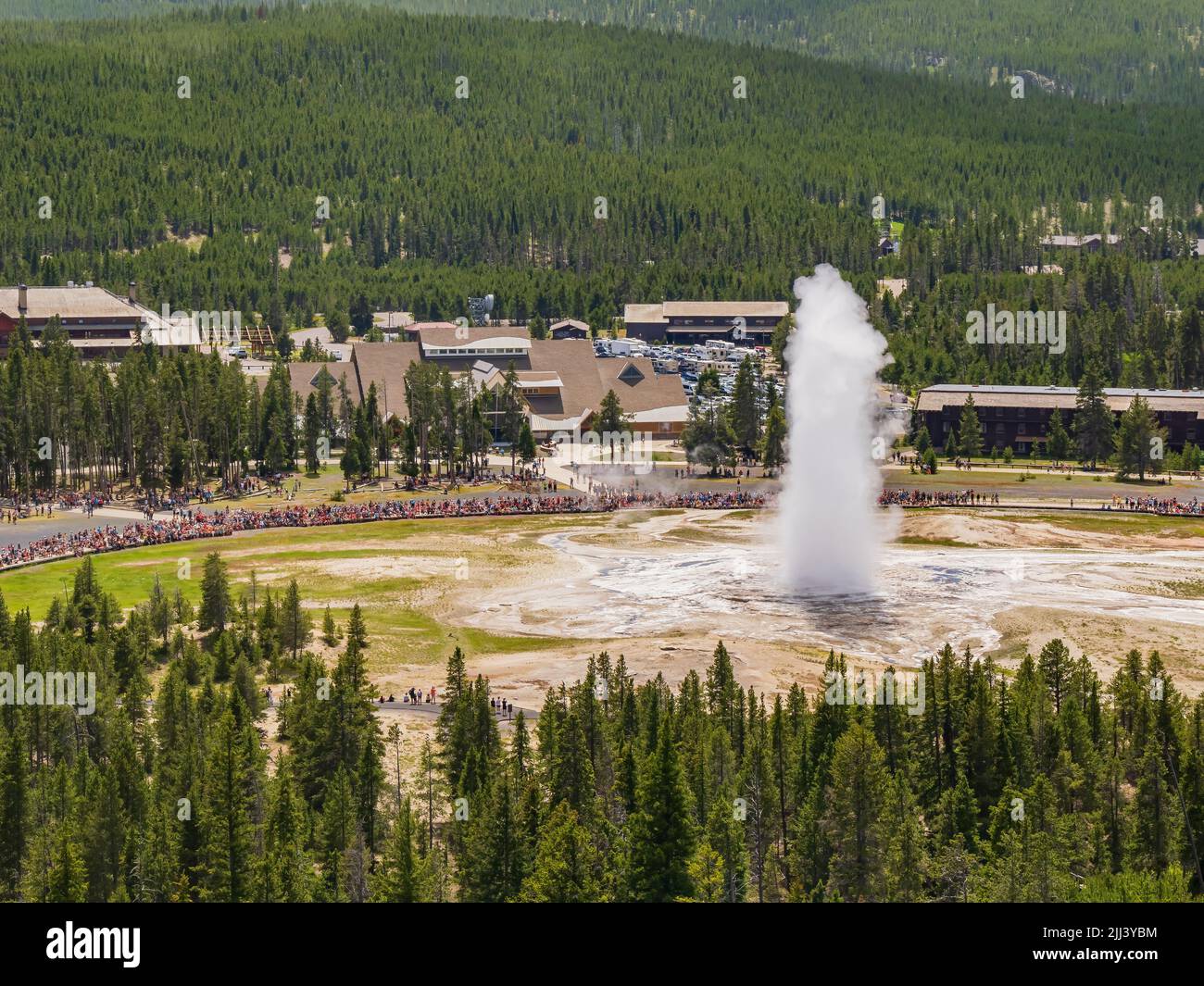 Aerial view of the Old Faithful geyser hot water eruptions at Wyoming ...