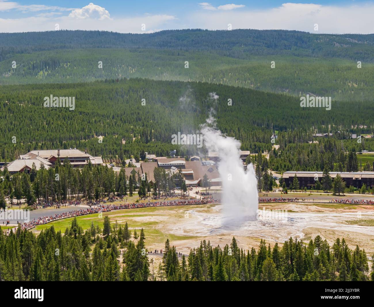 Aerial view of the Old Faithful geyser hot water eruptions at Wyoming ...