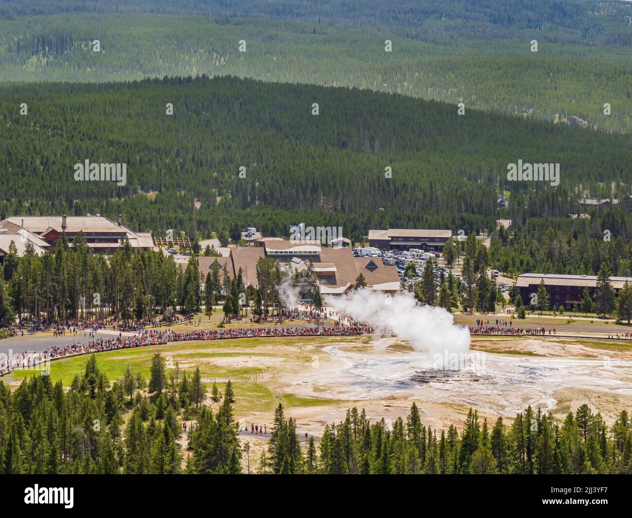 Aerial view of the Old Faithful geyser hot water eruptions at Wyoming ...