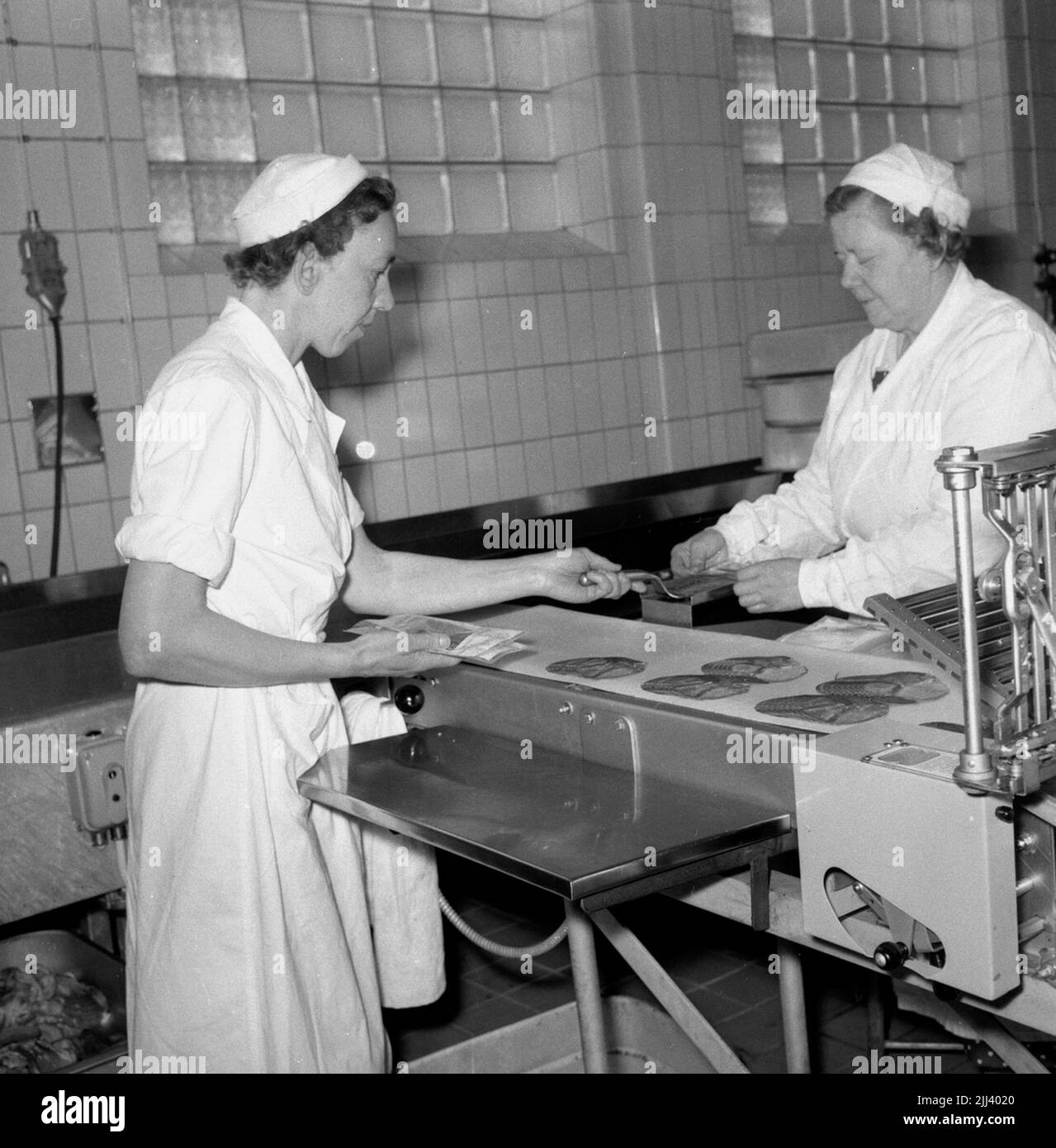 Consuming sandwich food. May 13, 1959 Stock Photo - Alamy