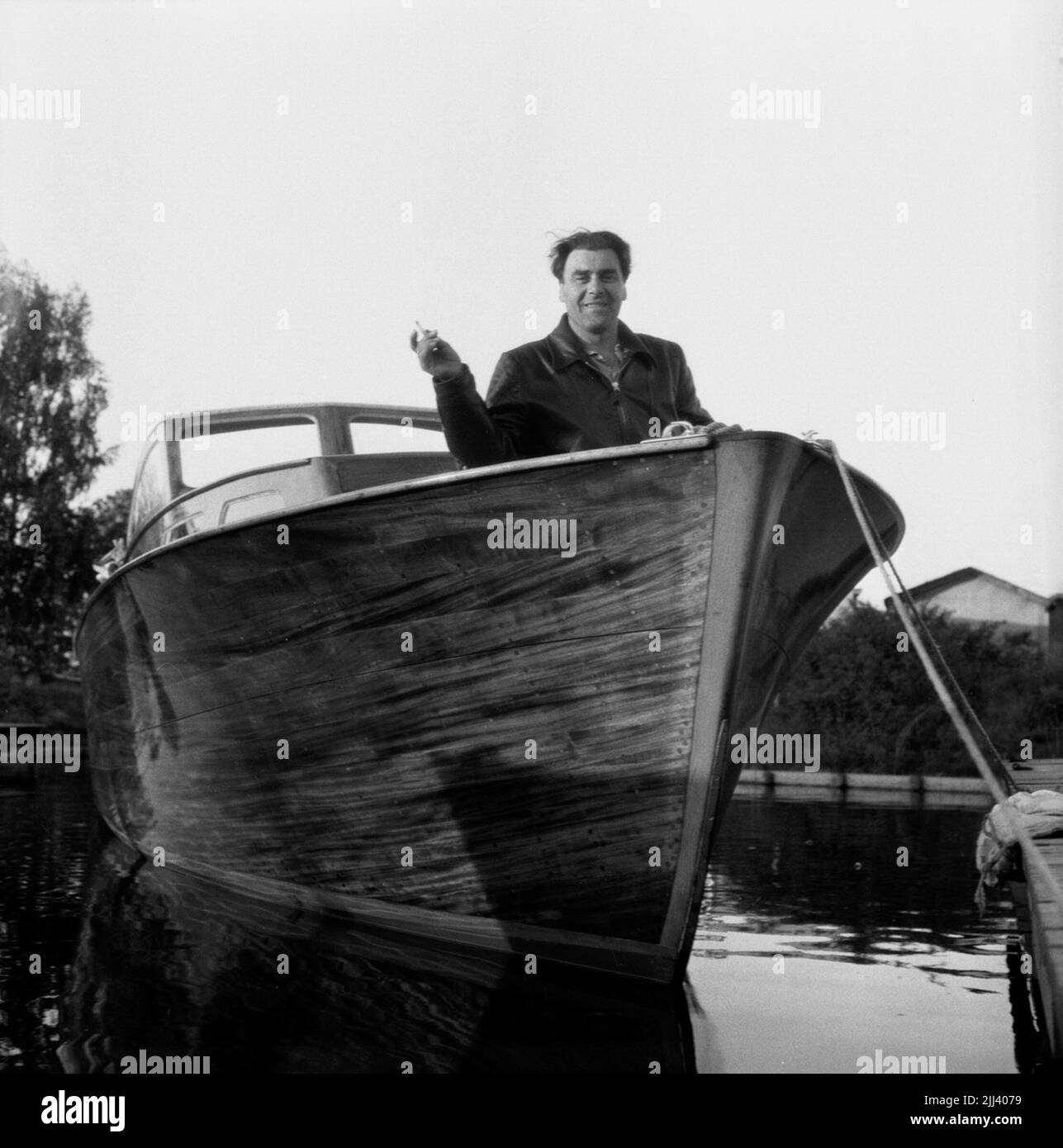 Wooden house floating on Black and White Stock Photos & Images - Alamy