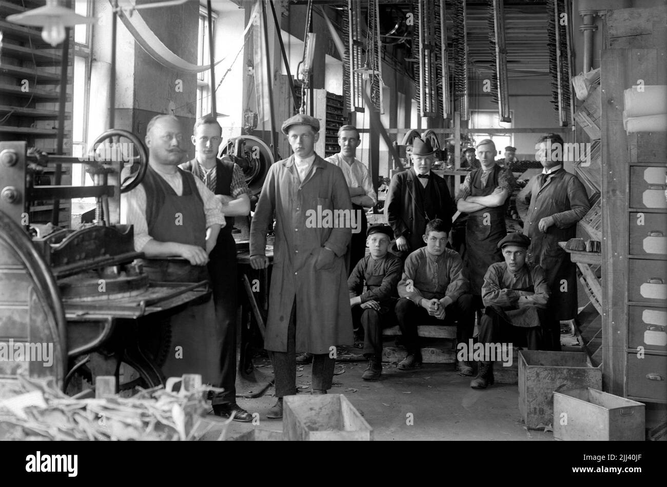 AB Mark's shoe factory, factory interior, 10 shoe workers. Mr. Melin ...