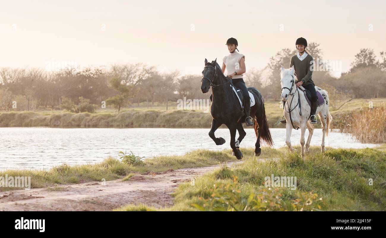 Riding is a well known stress relieve. two young women out horseback ...