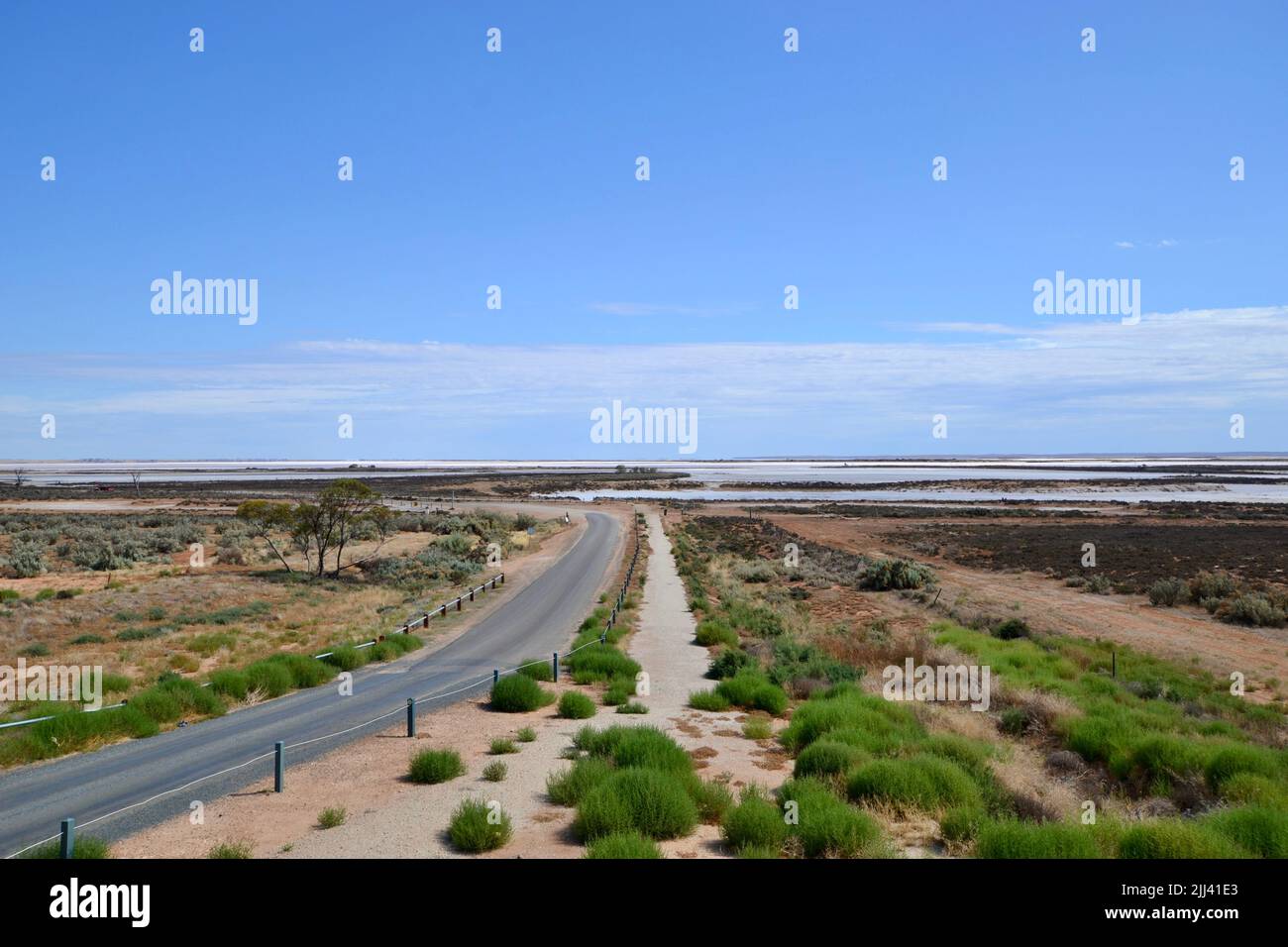 Flat horizon and picturesque landscape at the entrance to Lake Tyrrell ...
