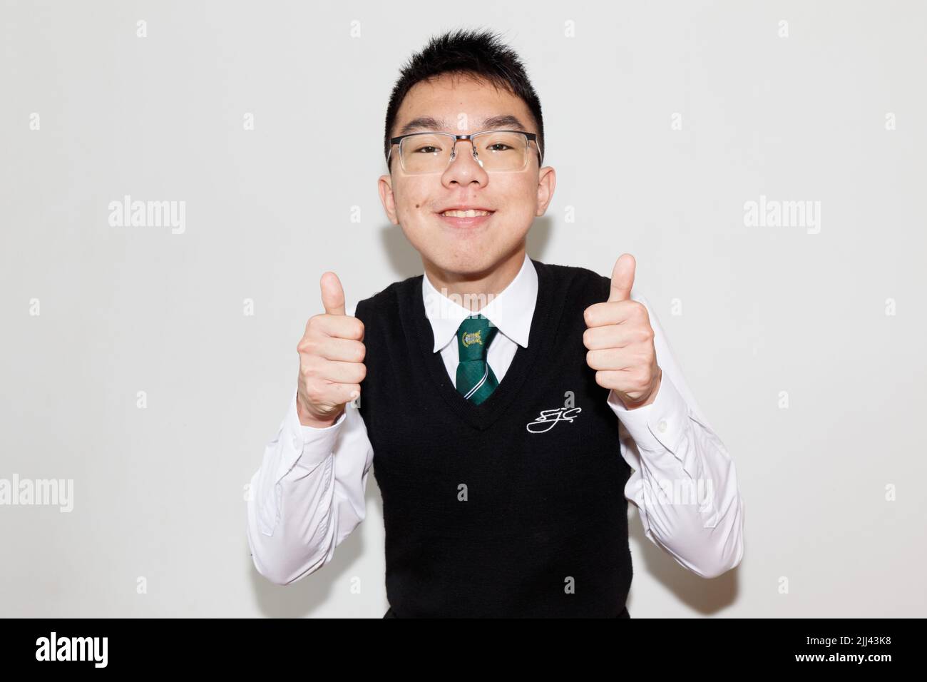 Teen boy speaking uniform hi-res stock photography and images - Alamy