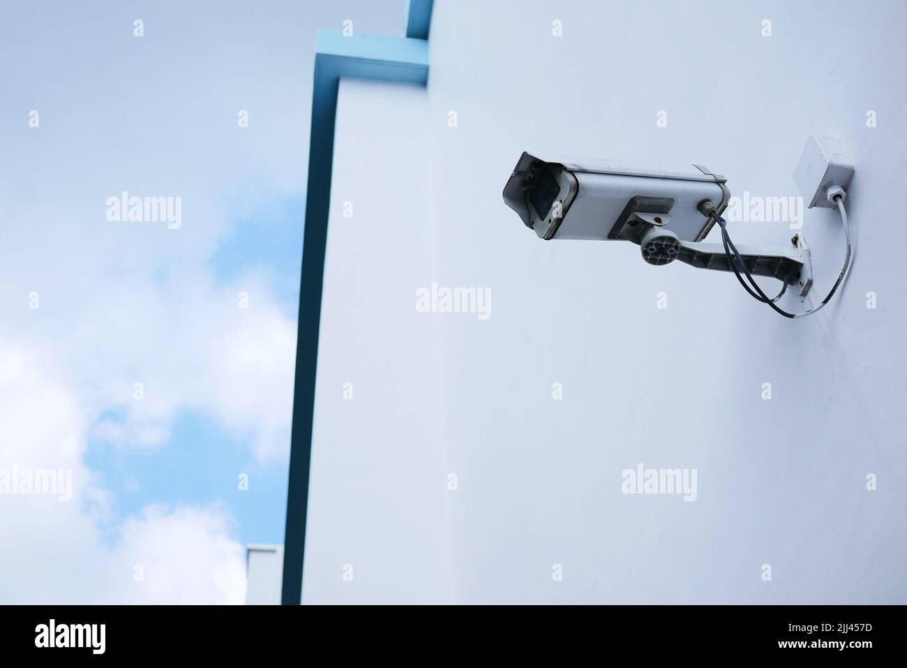CCTV security camera operating outdoor Stock Photo - Alamy