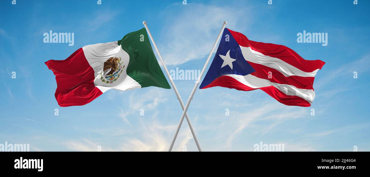 two crossed flags Puerto Rico and mexico waving in wind at cloudy sky. Concept of relationship ...