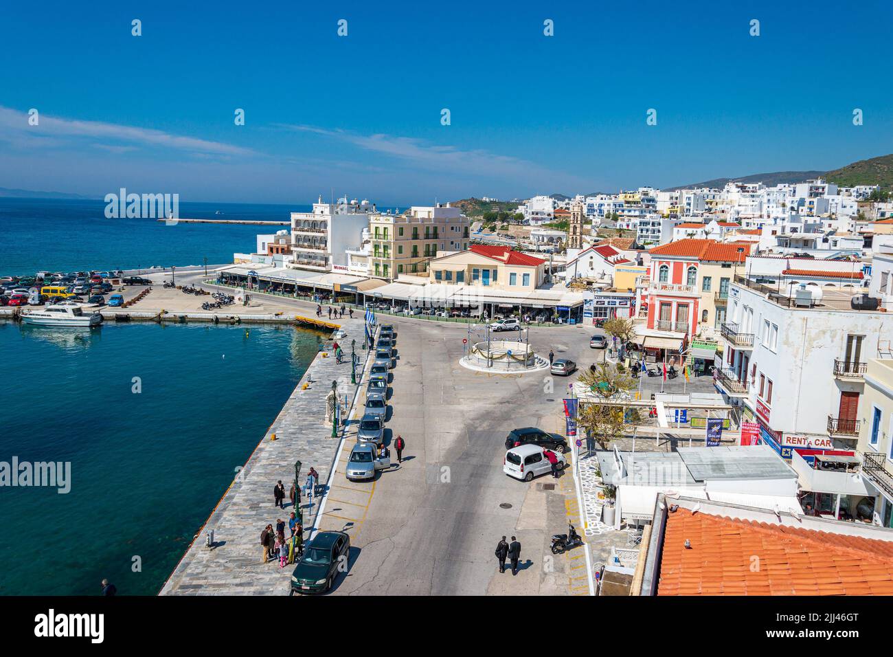 Urban view of Chora town in Tinos island around the port of Tinos in ...