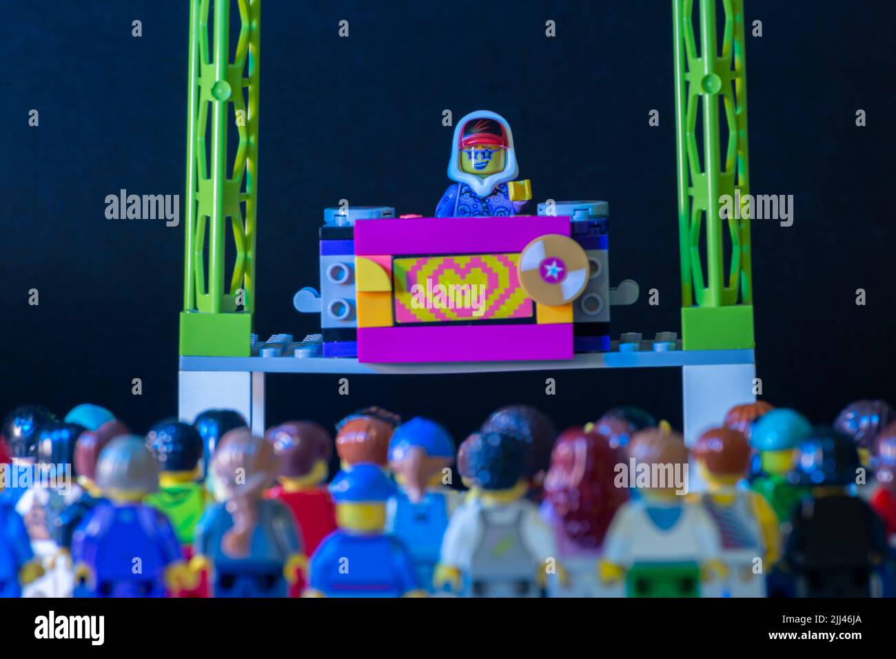 Lego DJ minifigure performing a show on stage with thousands of ...