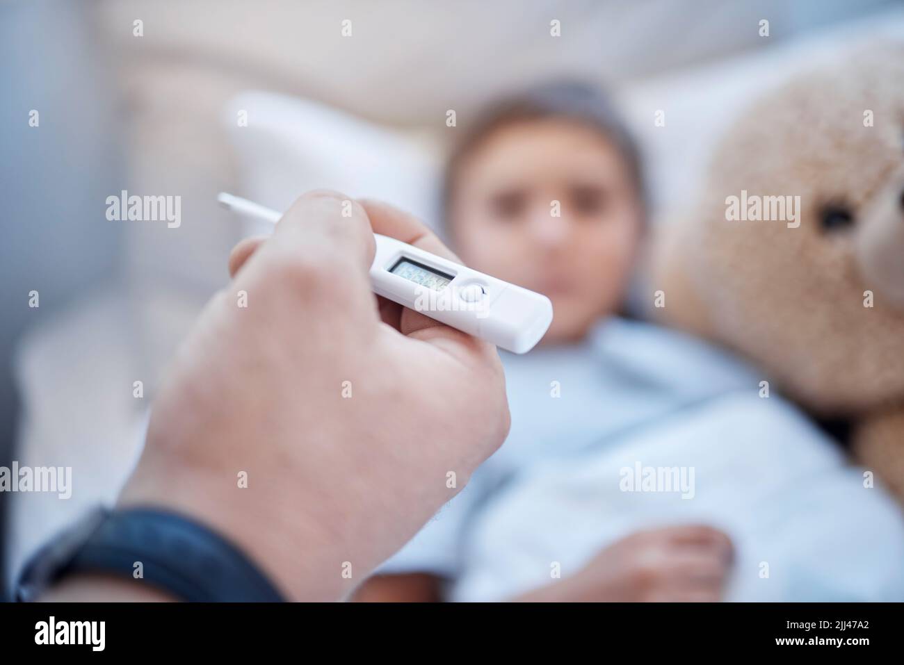 Looks like a fever. an unrecognizable doctor doing a checkup on a sick ...
