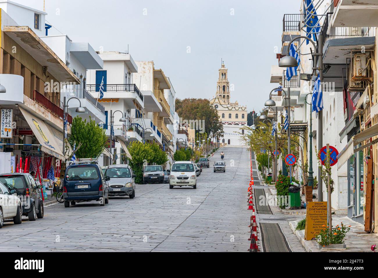 Urban view of Chora town in Tinos island around the port of Tinos in ...