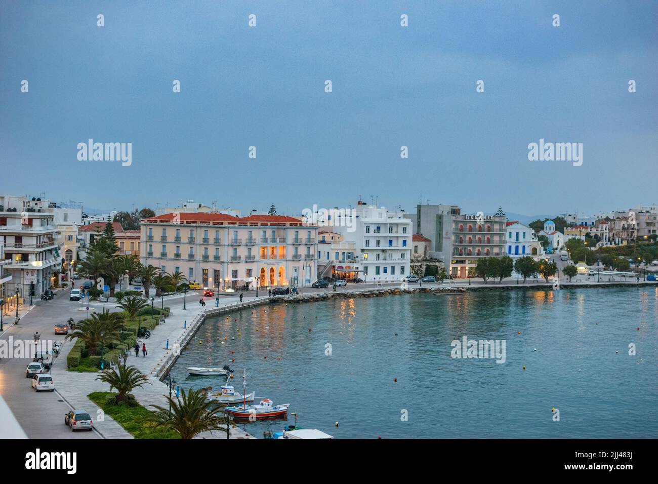 Urban view of Chora town in Tinos island around the port of Tinos in ...