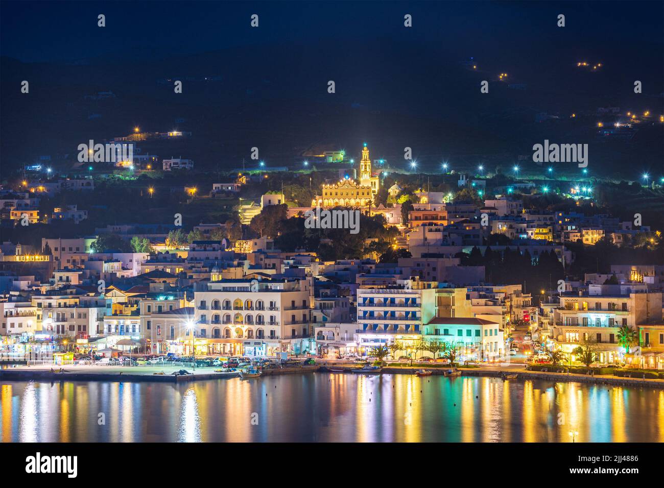 Night long exposure view of Tinos town. Centered the famous church of ...