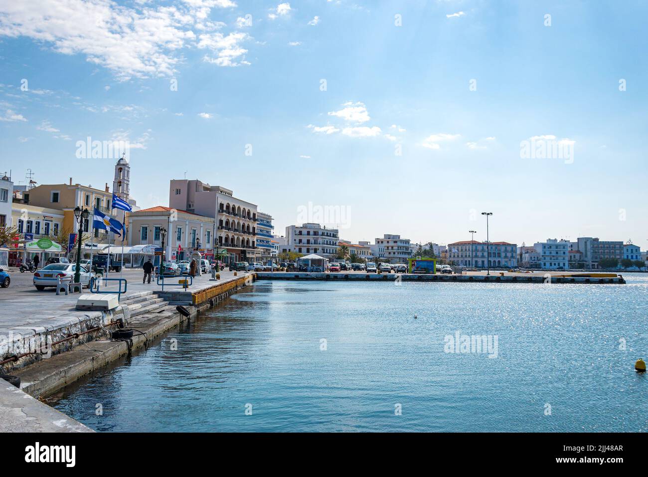Urban view of Chora town in Tinos island around the port of Tinos in ...