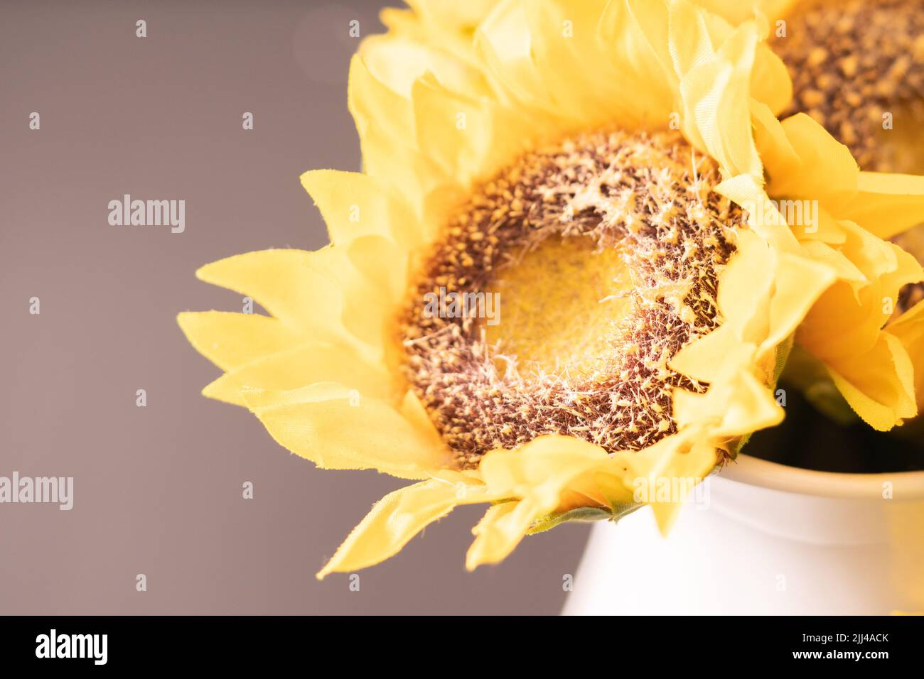 fake artificial sunflower decoration flower close up Stock Photo - Alamy