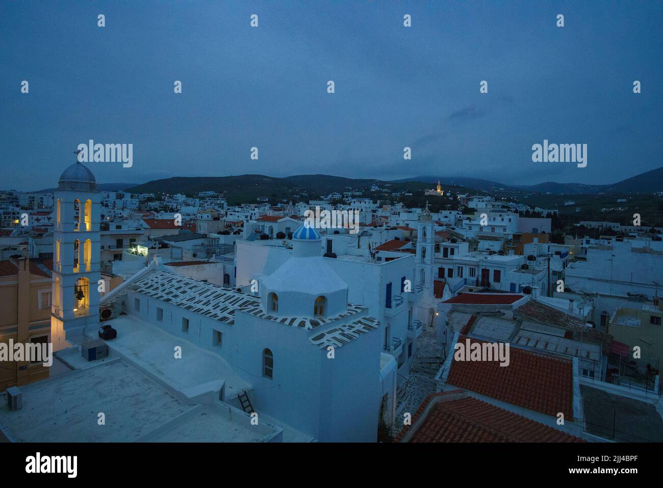 Urban view of Chora town in Tinos island around the port of Tinos in ...