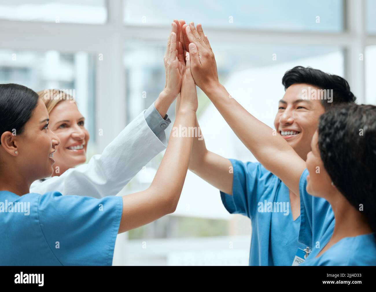 Diverse group people high five hi-res stock photography and images - Alamy