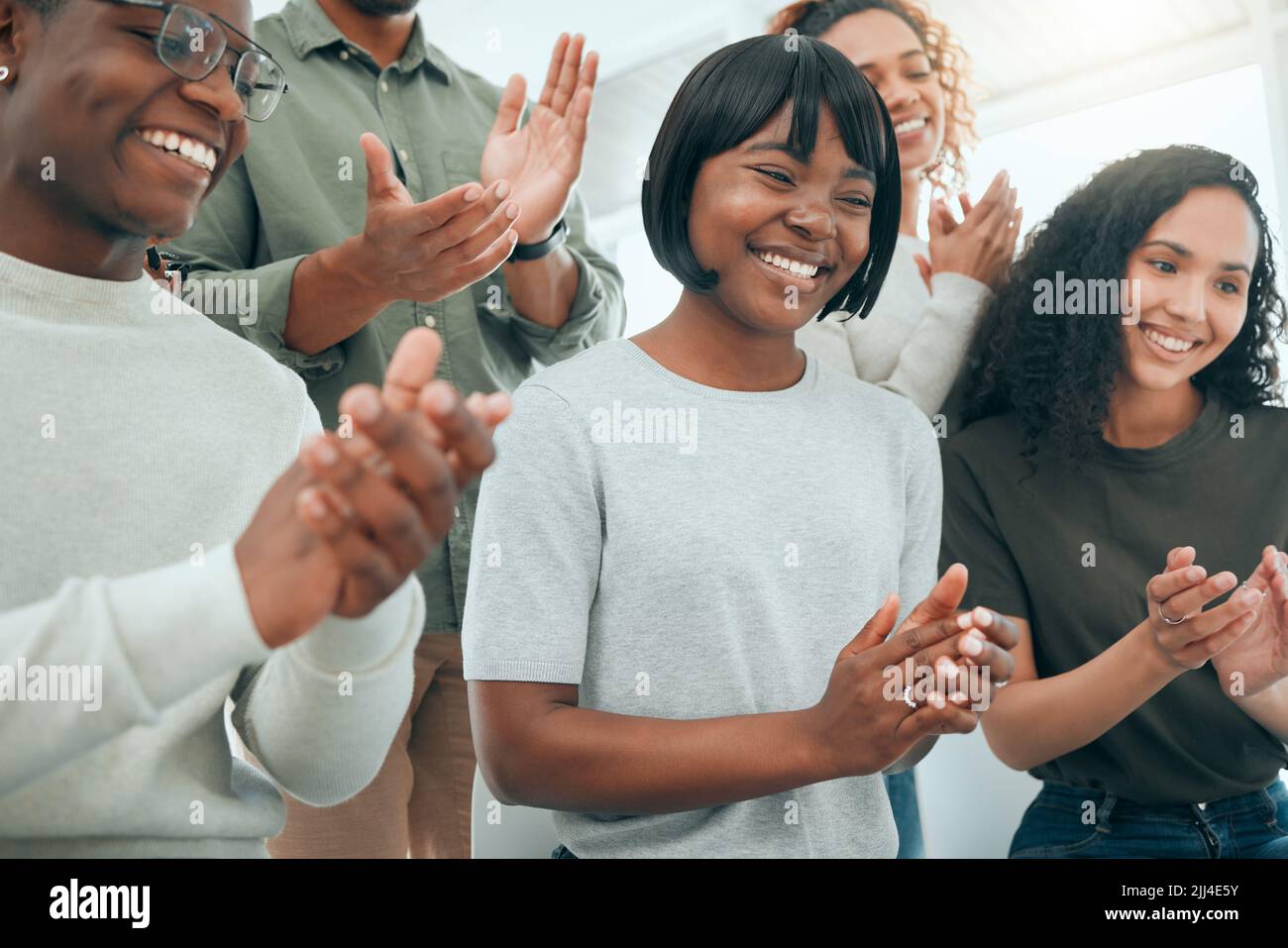 Another sober member on the team. a diverse group of people sitting ...